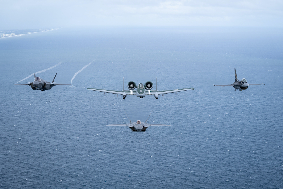 Air Force demonstration team jets come together for special formation