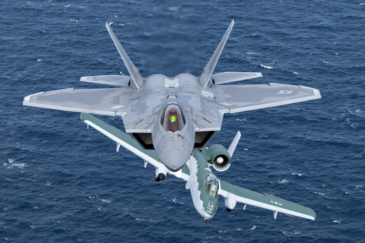 Air Force demonstration team jets come together for special formation