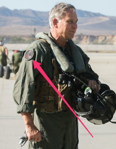 Navy undersecretary Gregory Slavonic has a Clint Eastwood flight patch