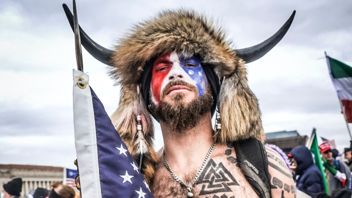 The 'QAnon shaman' from the Capitol riots is a freaking Navy veteran