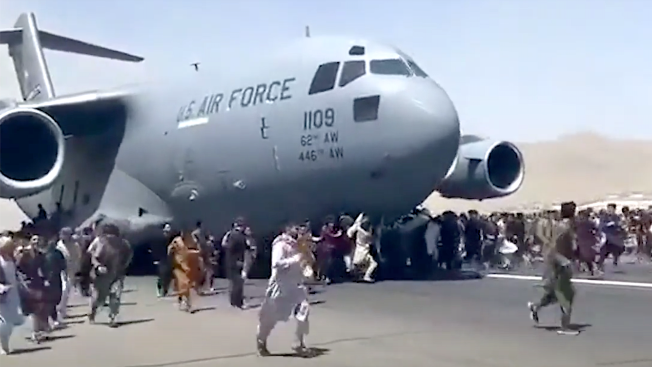Afghans are clinging to US military aircraft to escape the Taliban