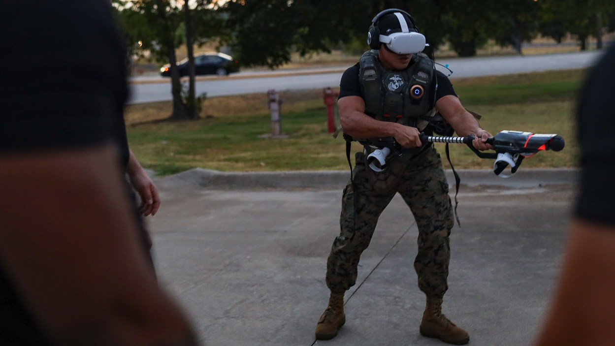 Marines use virtual reality pugil stick simulator as a recruiting tool
