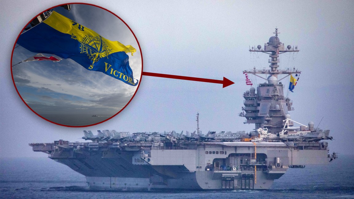 Navy aircraft carrier USS Gerald R. Ford flies new battle flag at sea