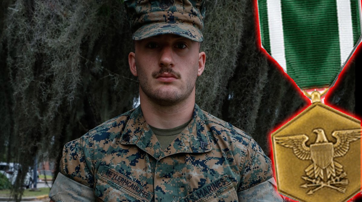 Marine receives medal for saving woman from ocean during storm