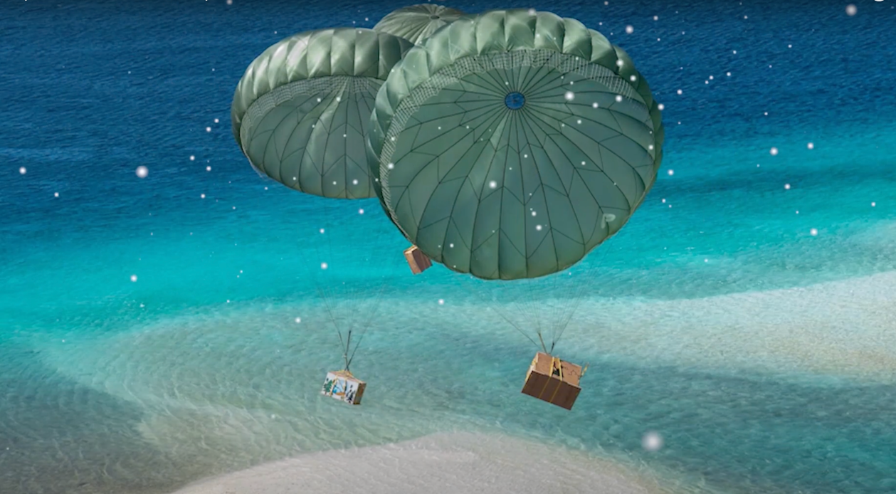 Air Force's Operation Christmas Drop parachutes in holiday spirits