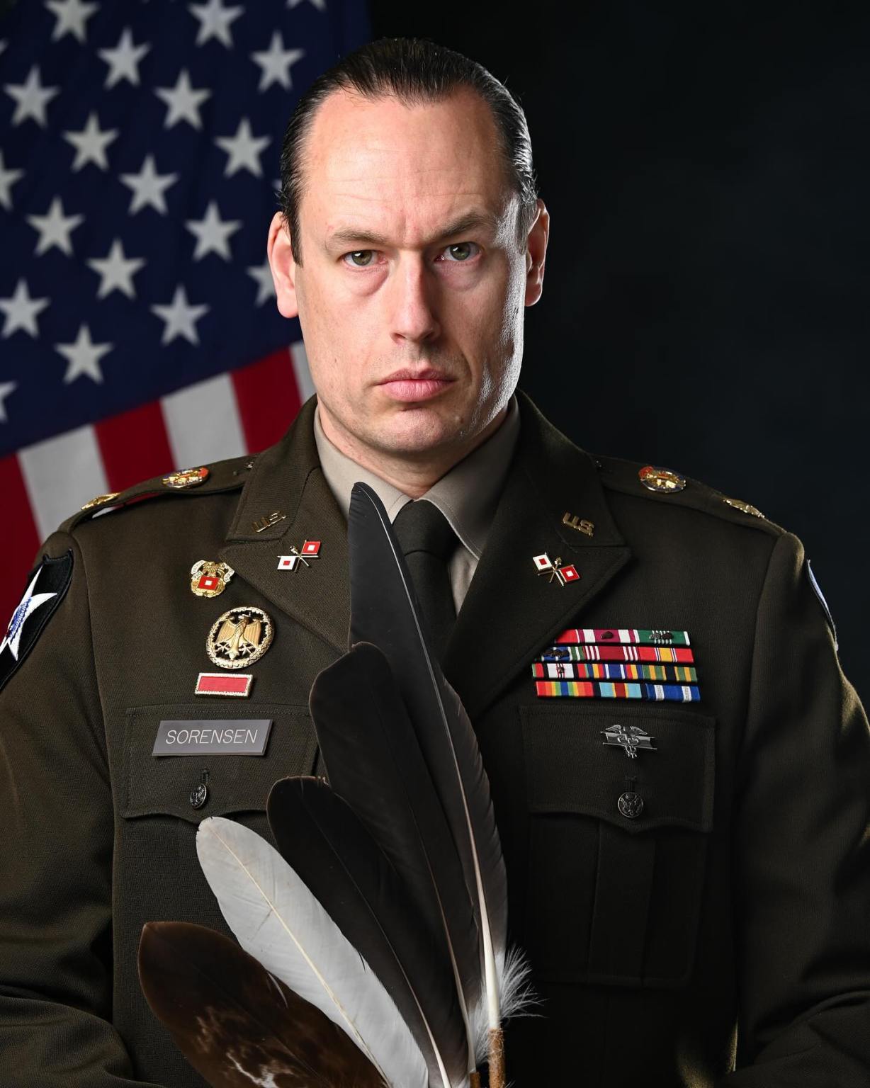 Army major honors fallen soldiers with Native eagle feathers in hair