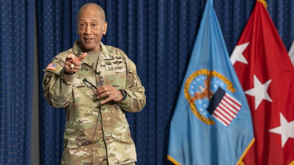 Suspended Army general denies he pushed an officer's promotion