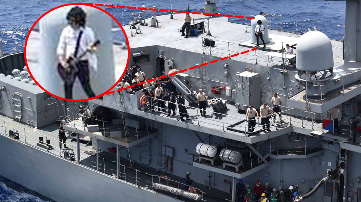This USS Abraham Lincoln sailor proudly wears 'E-4 Mafia' patch