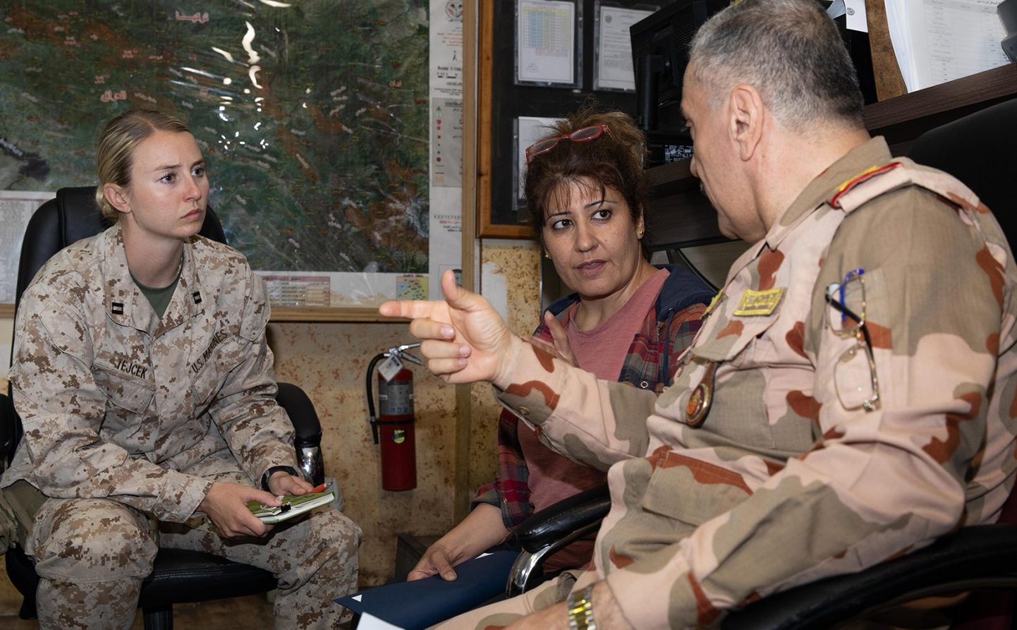 Marine training for winter Olympics Bobsled team while in Iraq