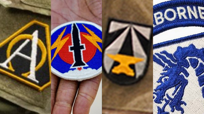 This USS Abraham Lincoln sailor proudly wears 'E-4 Mafia' patch