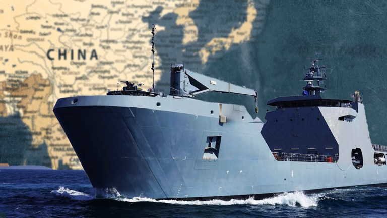 Marine Corps straps electronic warfare LAV to deck of Navy warship